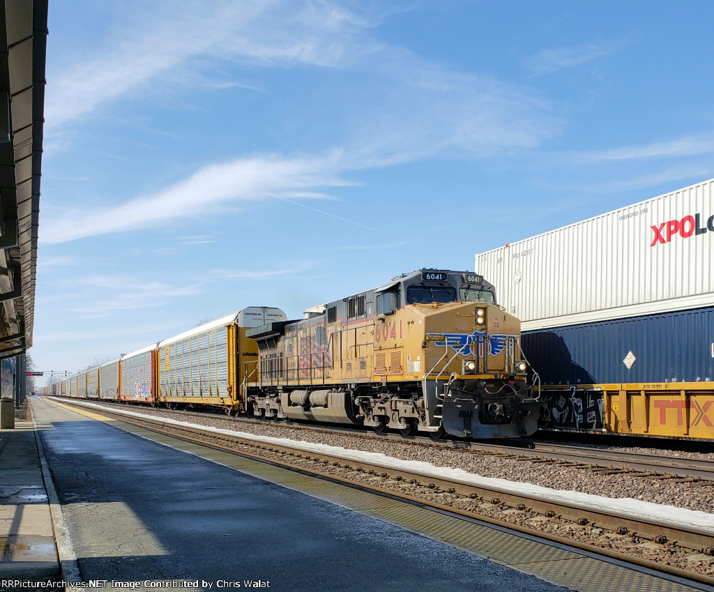 UP 6041 leads a east bound Auto Rack train as it passes the Elburn,IL Station